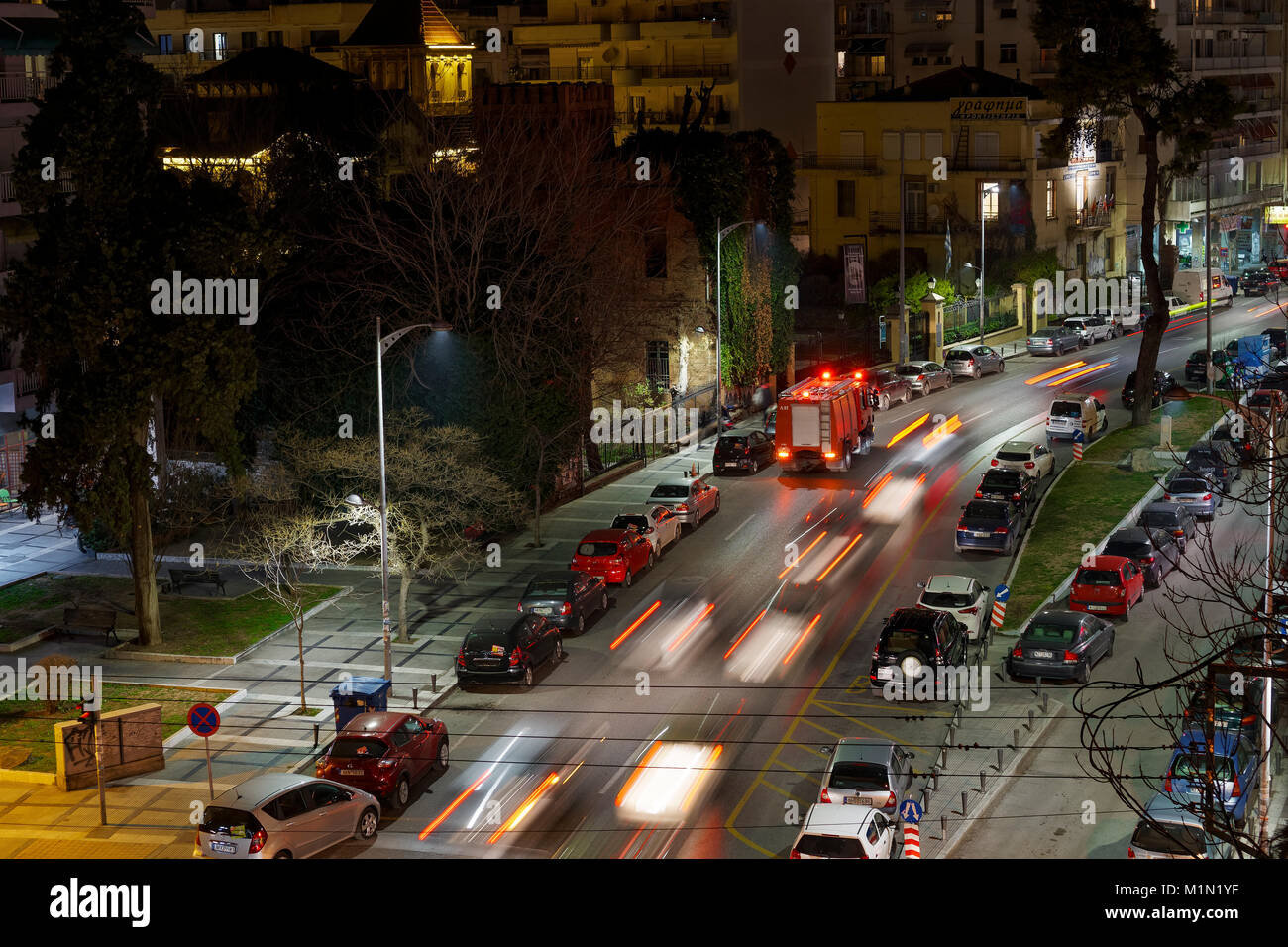 Greek Fire Service track with siren on during fire at night. Hellenic ...