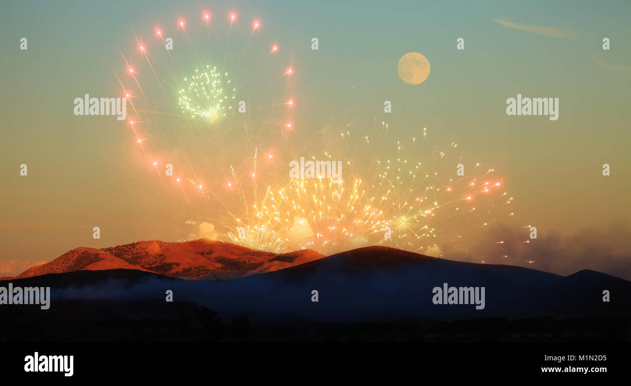 beautiful fireworks in sunset time with ricing moon on horizon Stock ...