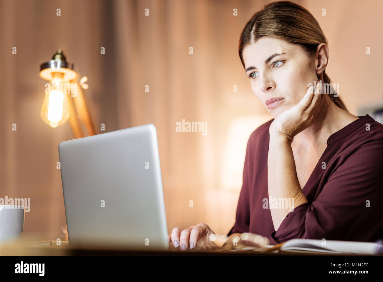 Woman staring distance office hi-res stock photography and images - Alamy