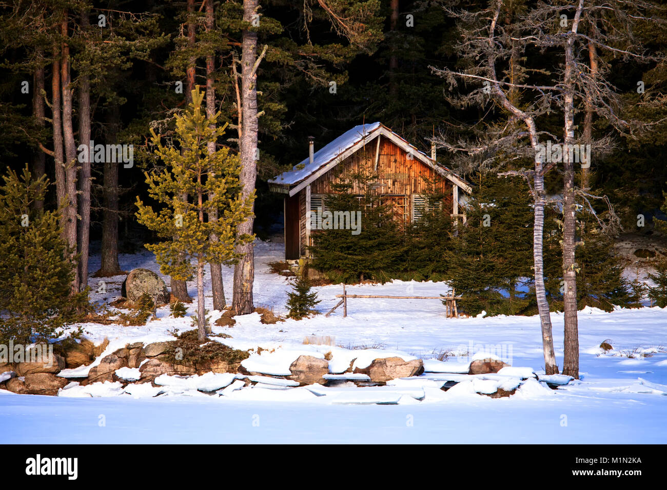 wooden nature hut in snow european mountains Stock Photo - Alamy