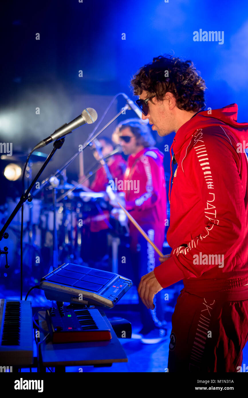 The red jumpsuit-wearing Norwegian electronic rock band Datarock is here seen doing a sound ...