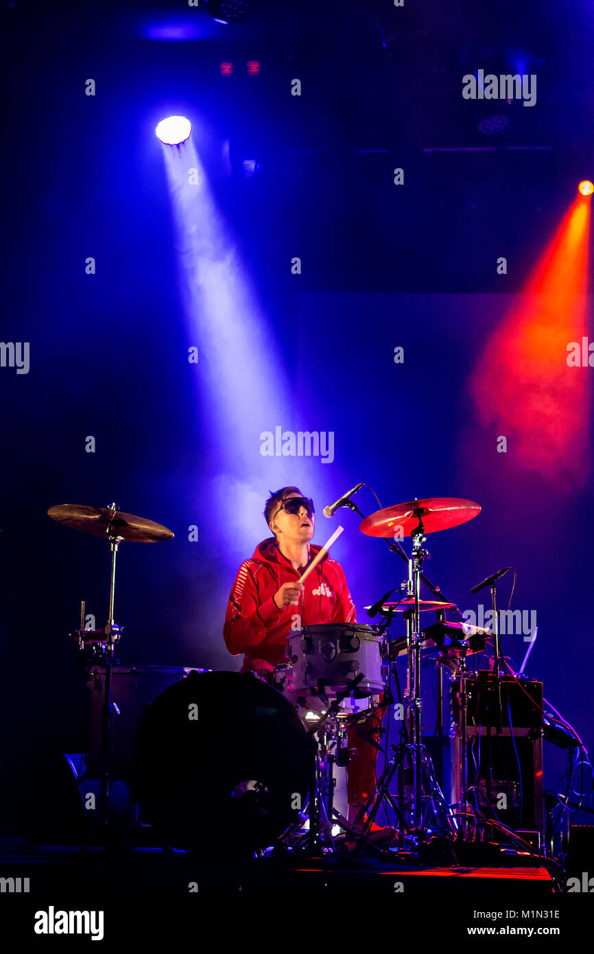The red jumpsuit-wearing Norwegian electronic rock band Datarock is here seen doing a sound ...