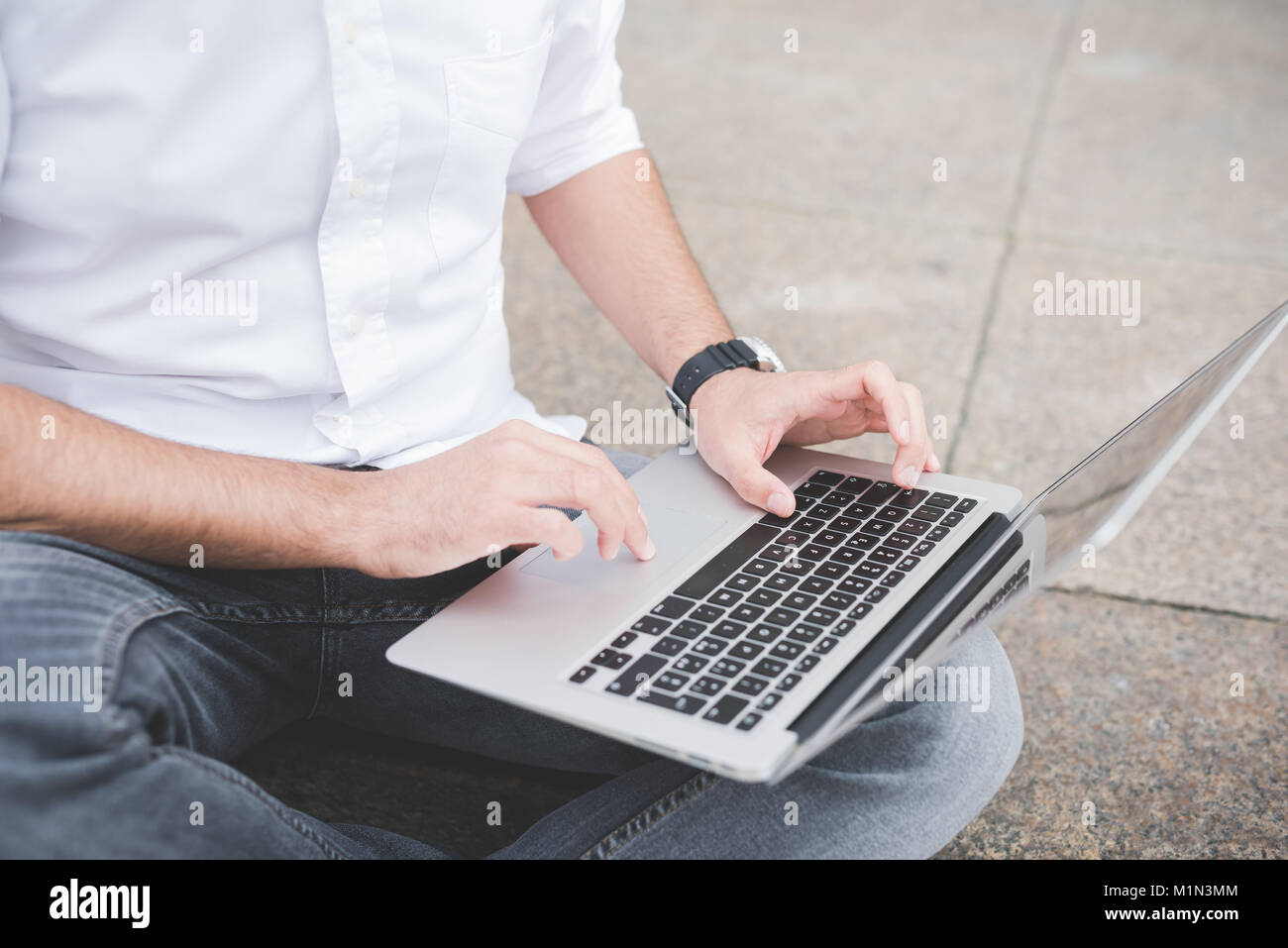 Close up man hand using computer outdoor - business, technology, social ...