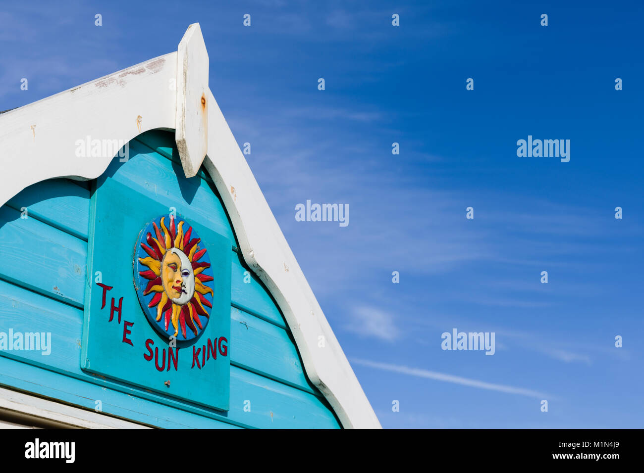 Close up of pitched roof detail and sign on traditional wooden beach ...