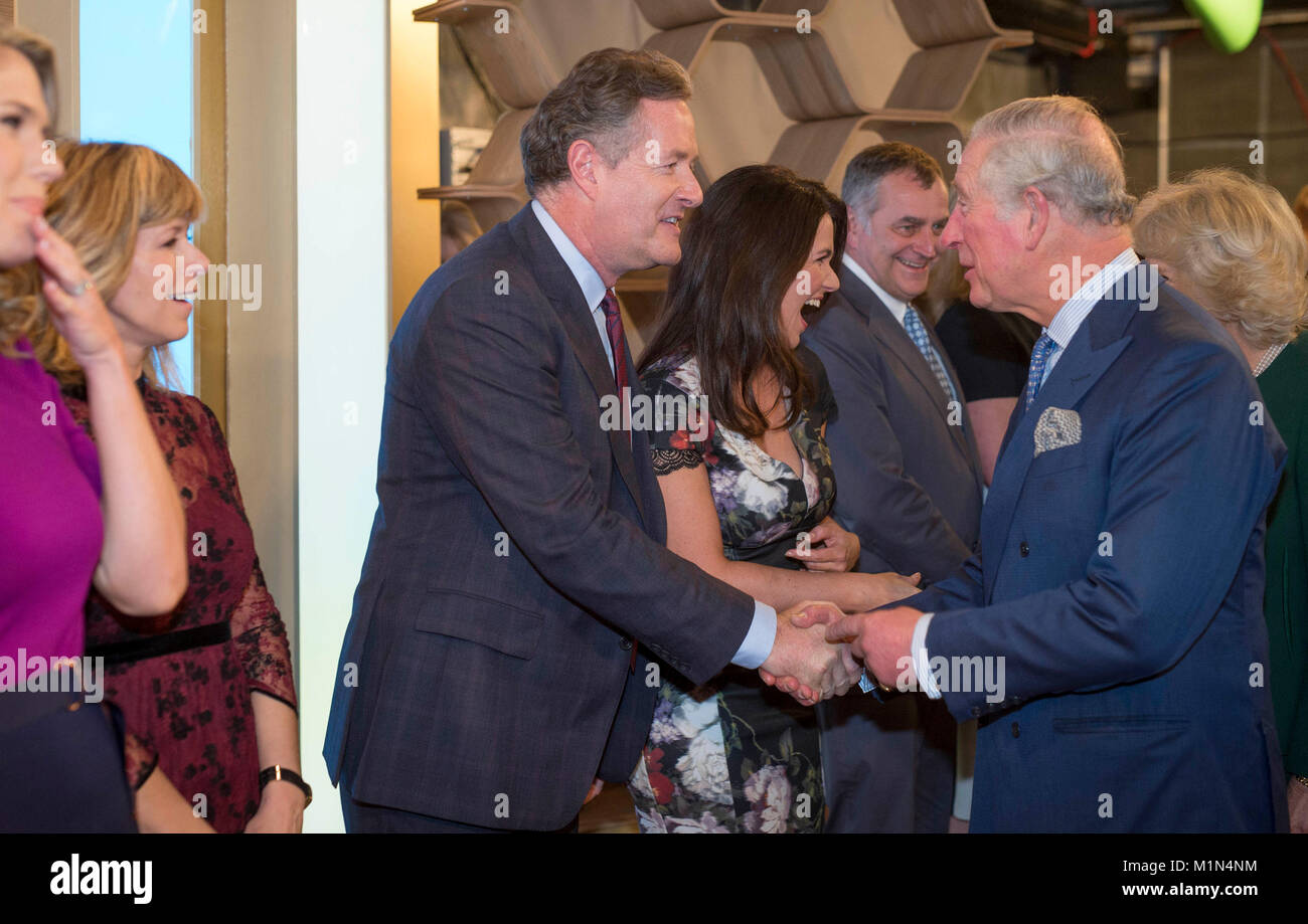 The Prince of Wales meets Piers Morgan during a visit to the London ...