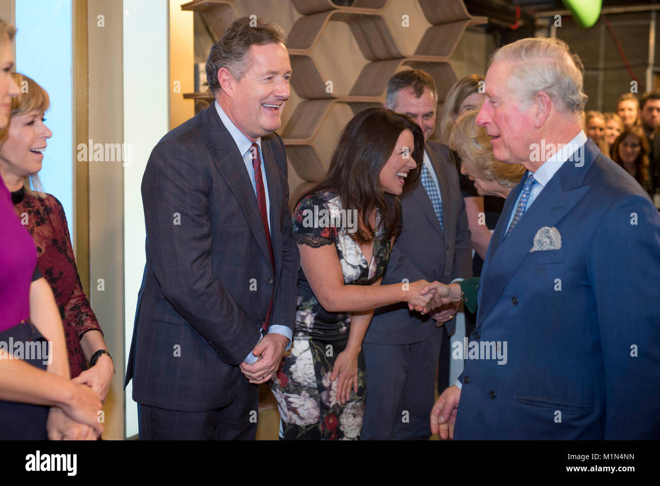 The Prince of Wales meets Piers Morgan during a visit to the London ...