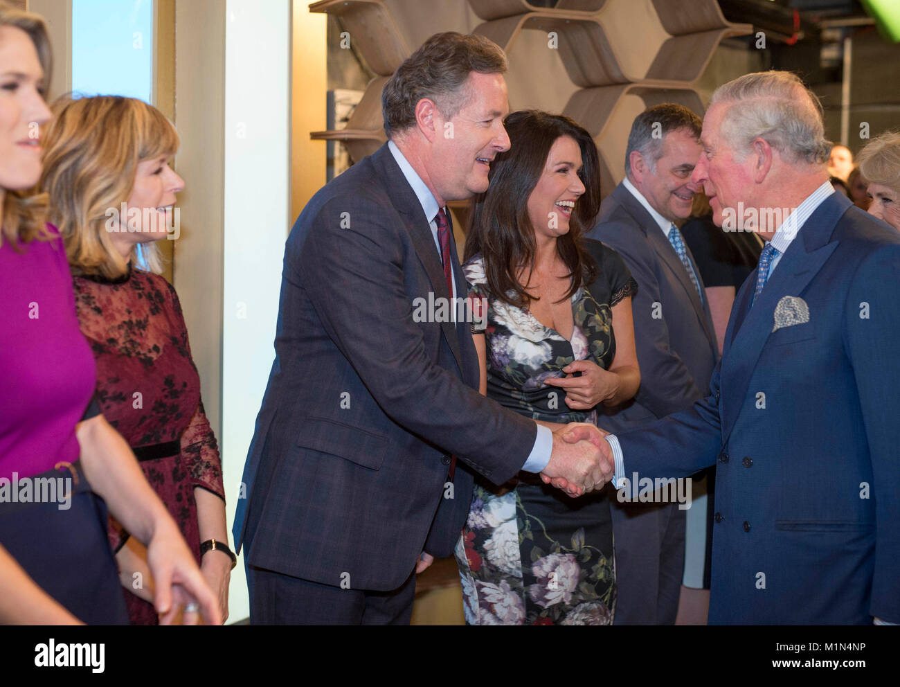 The Prince of Wales meets Piers Morgan during a visit to the London ...