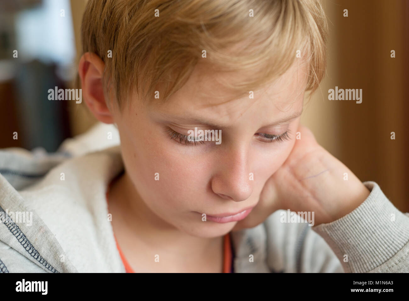 Portrait of a frustrated boy Stock Photo - Alamy