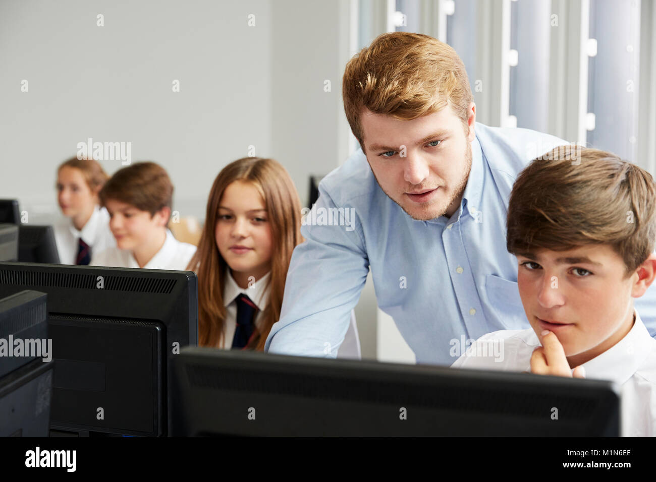 Group student in classroom uniform hi-res stock photography and images ...