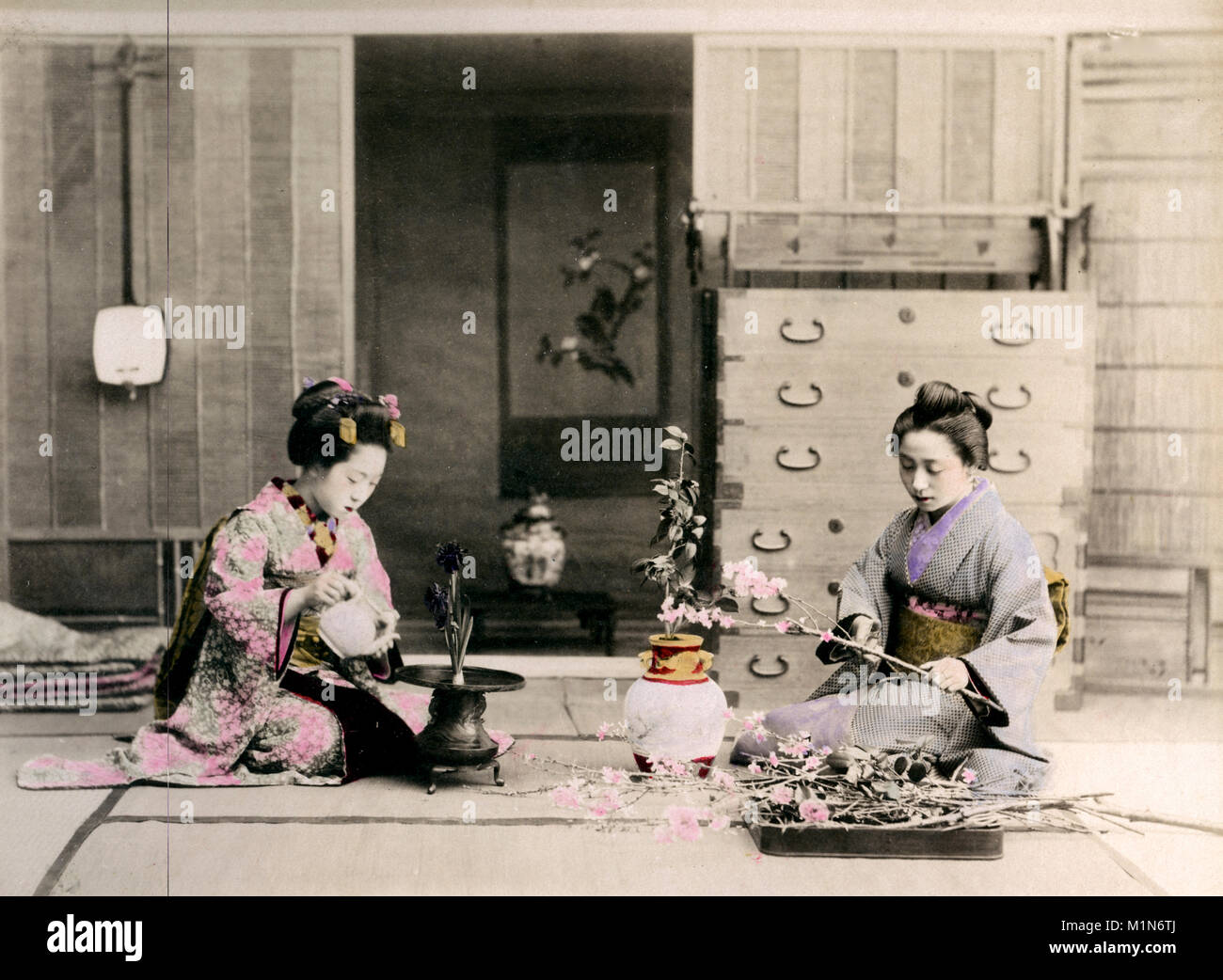 c.1880's Japan - geishas arranging flowers Stock Photo - Alamy