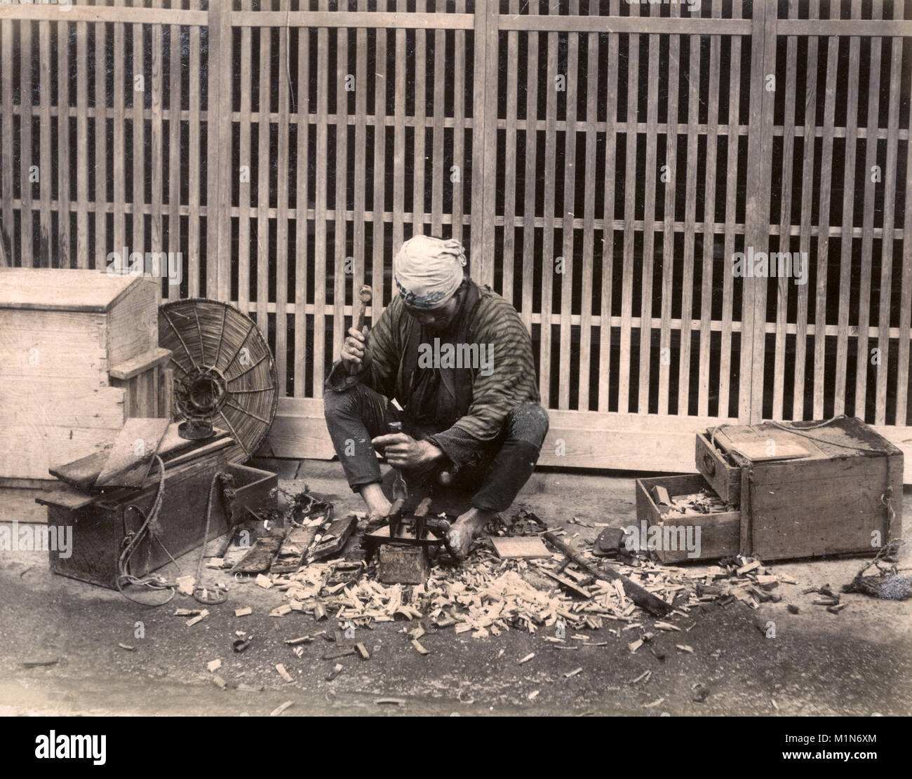 c.1880's Japan - carpenter with tools at work Stock Photo - Alamy