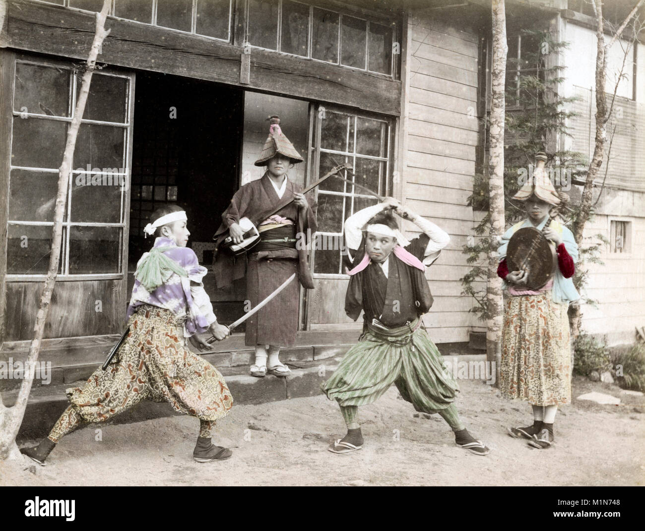 c.1880's Japan - actors palying the part of warriors with musicians ...