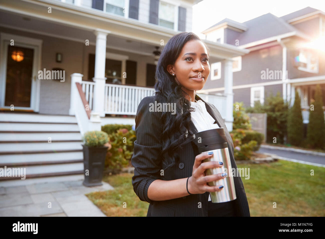 Woman leaving home for work hi-res stock photography and images - Alamy