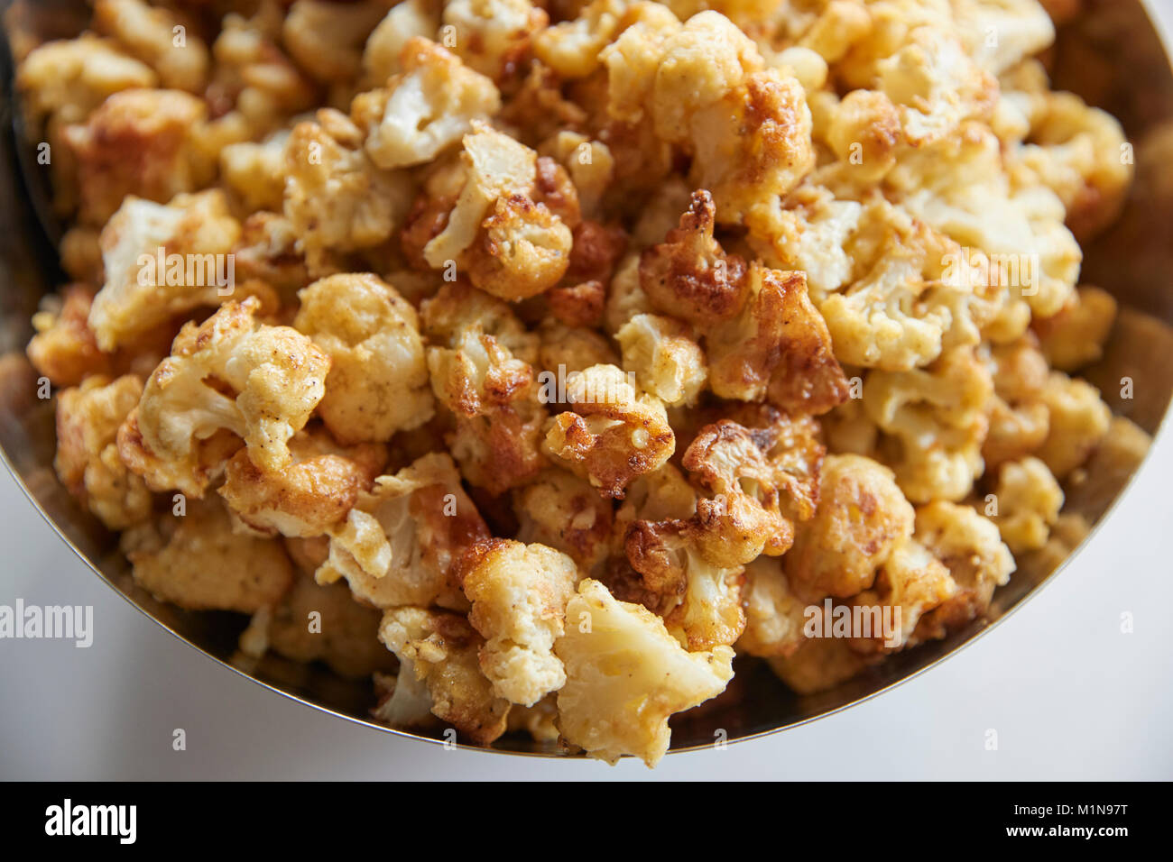 Bowl Of Cauliflower Rice Chunks In Coffee Shop Stock Photo - Alamy
