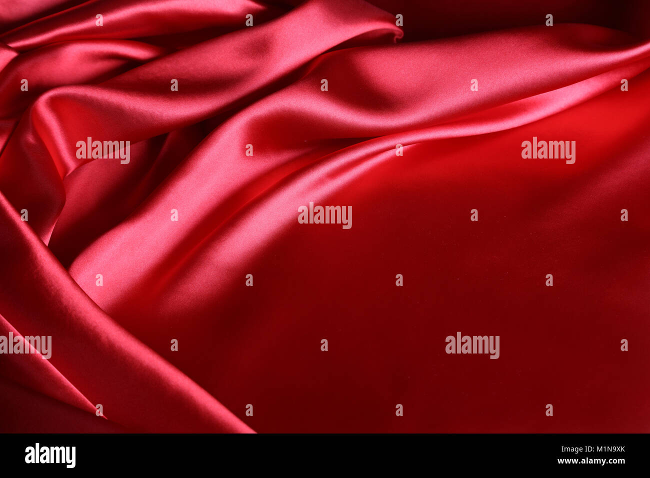 Closeup of ripples in red silk fabric Stock Photo - Alamy