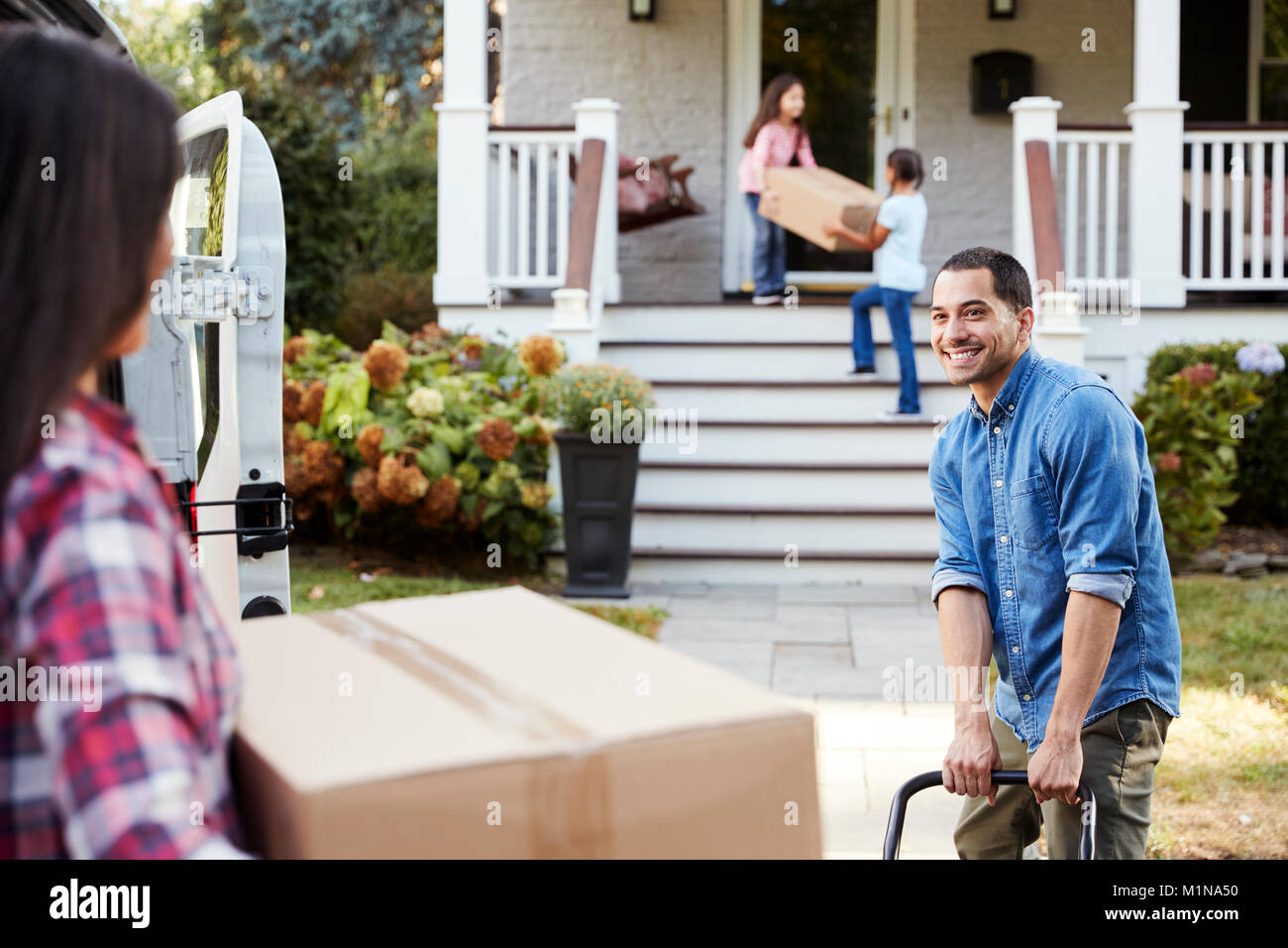 Helping unload truck hi-res stock photography and images - Alamy