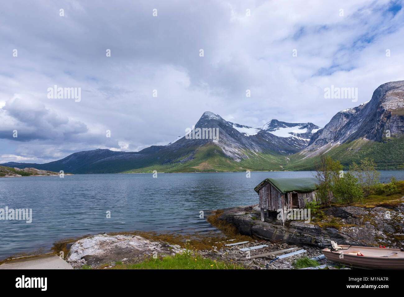 Wooden fishing boat hut along Norwegian County Road 17 from Bodo to ...