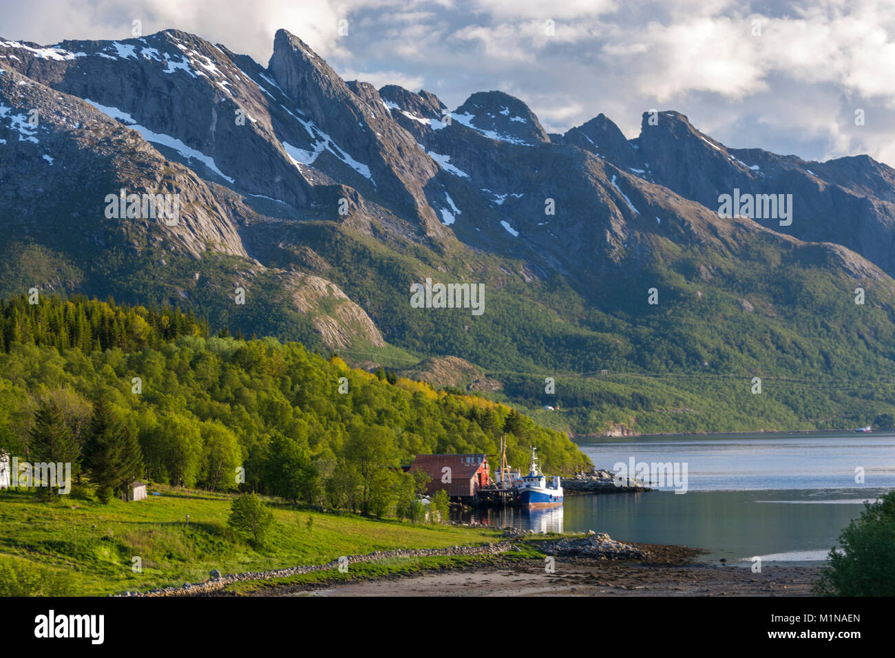 Fishing boat in a harbor along Norwegian County Road 17 from Bodo to ...