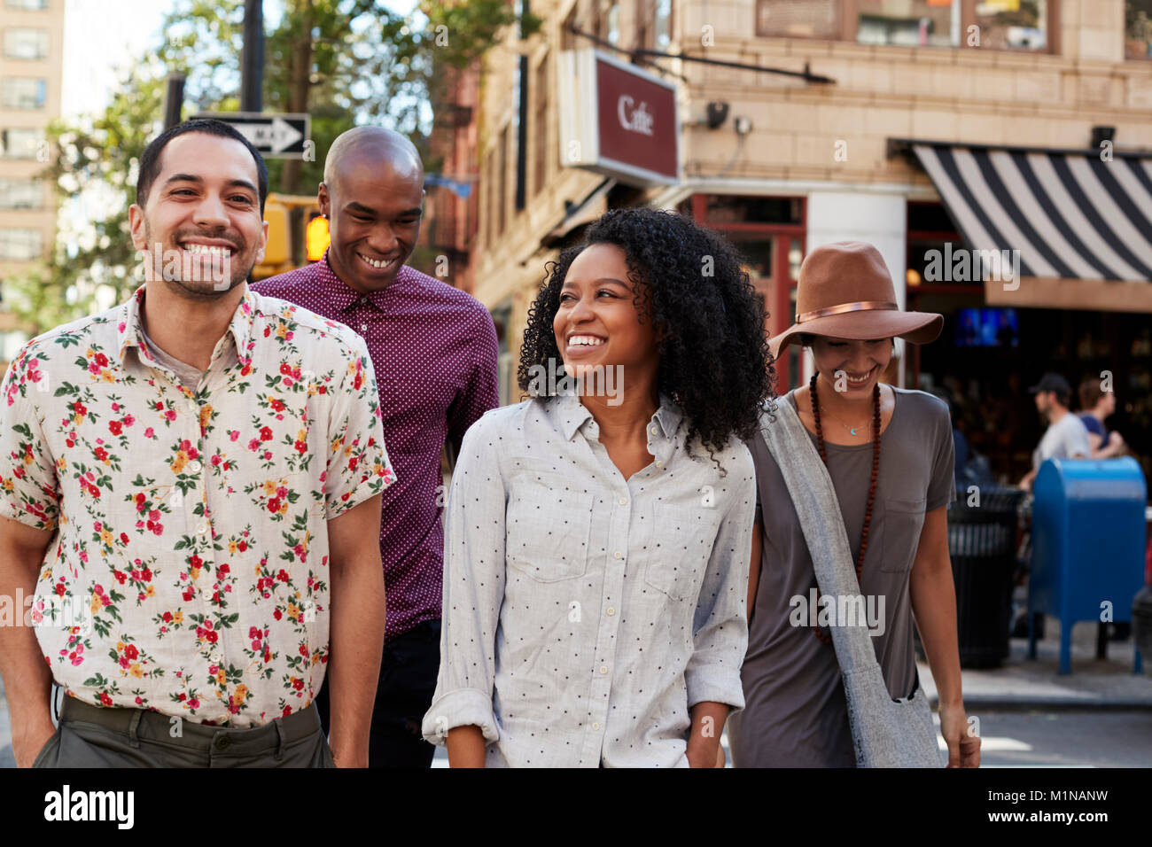 Group Of Friends Crossing Urban Street In New York City Stock Photo - Alamy