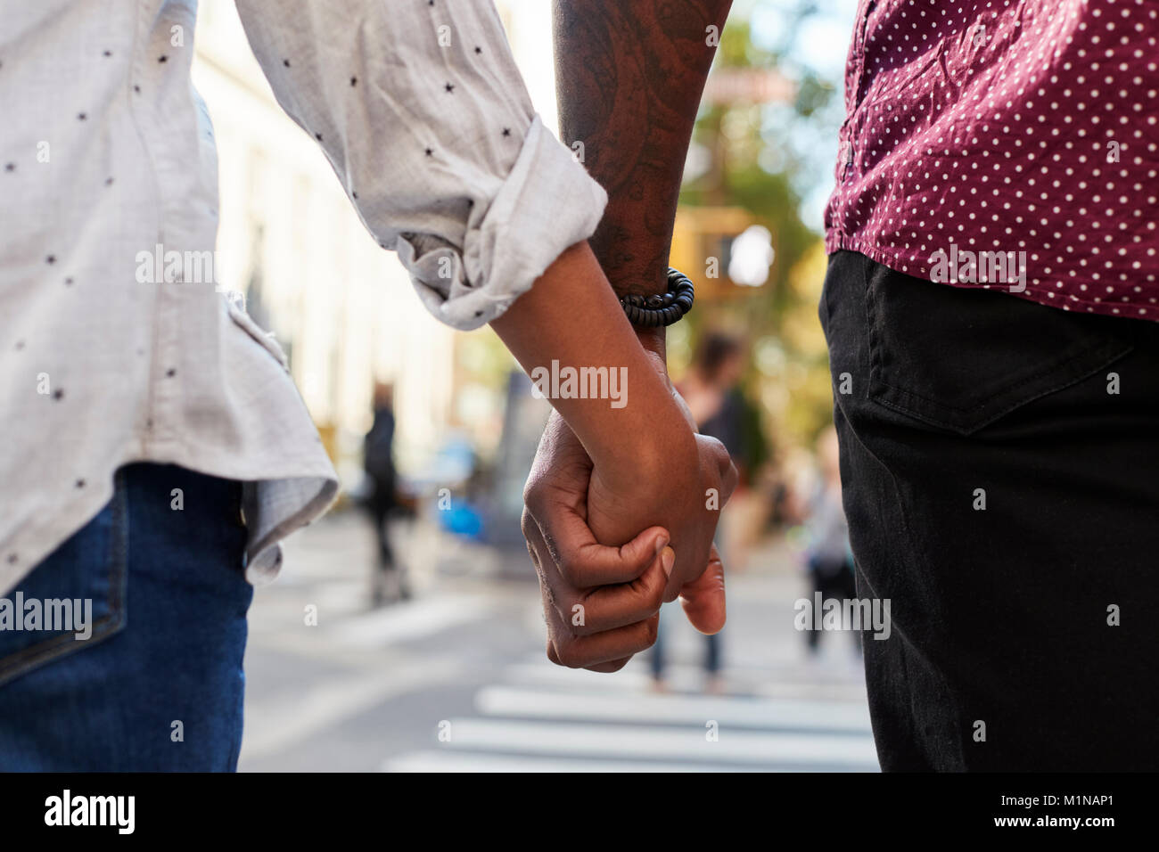 Two Women Holding Hands