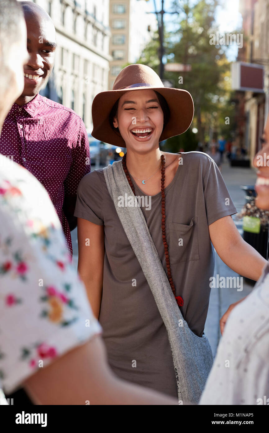 Group talking on street hi-res stock photography and images - Alamy