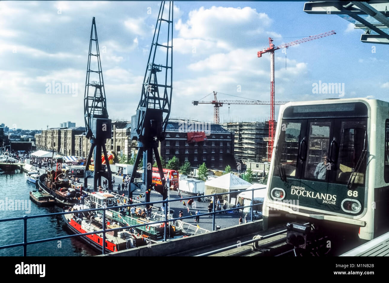 Dockland Light Railway leaving docklands station Stock Photo - Alamy