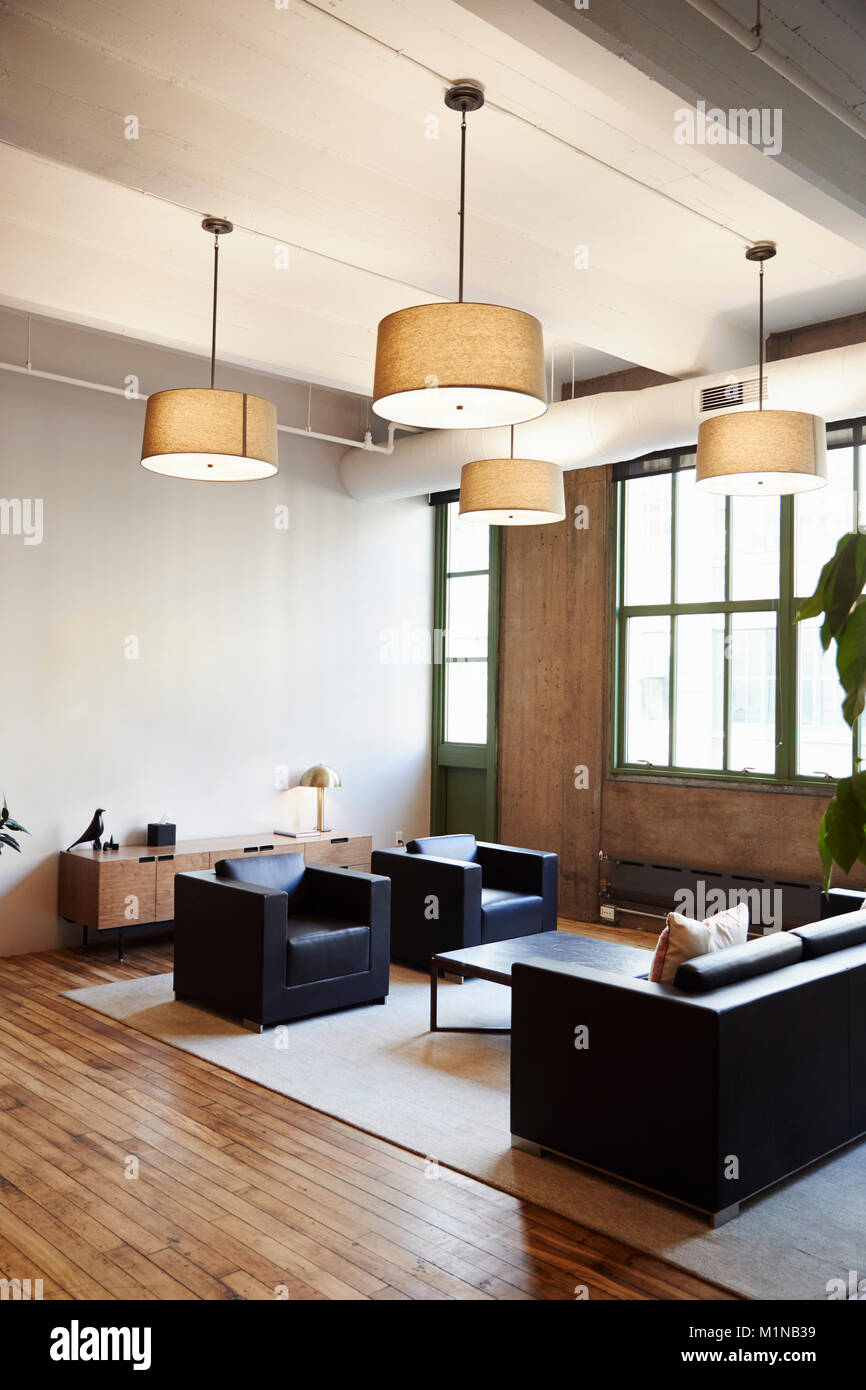 Empty lounge area in luxury business premises, vertical Stock Photo - Alamy