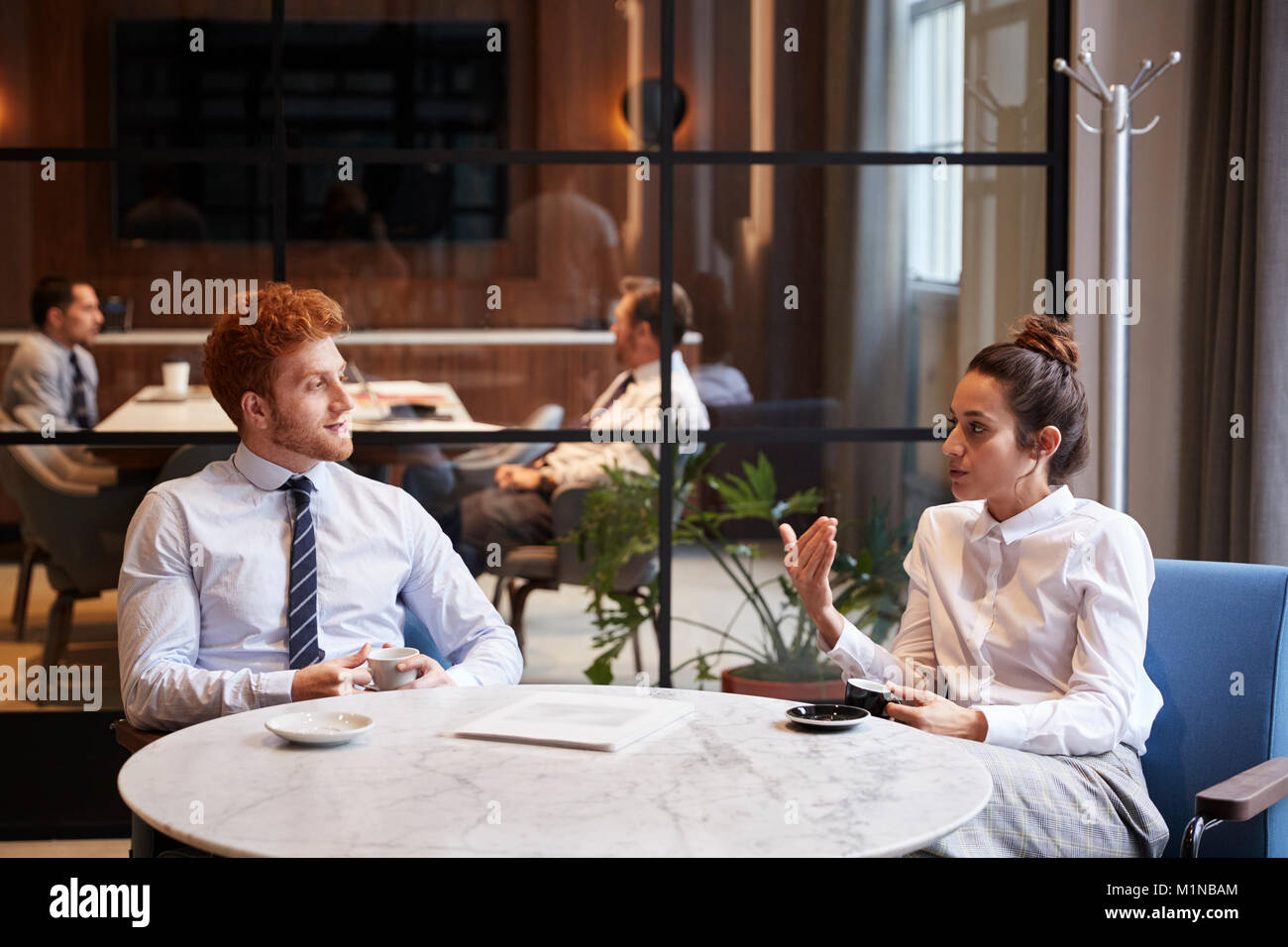 People talking over coffee hi-res stock photography and images - Alamy