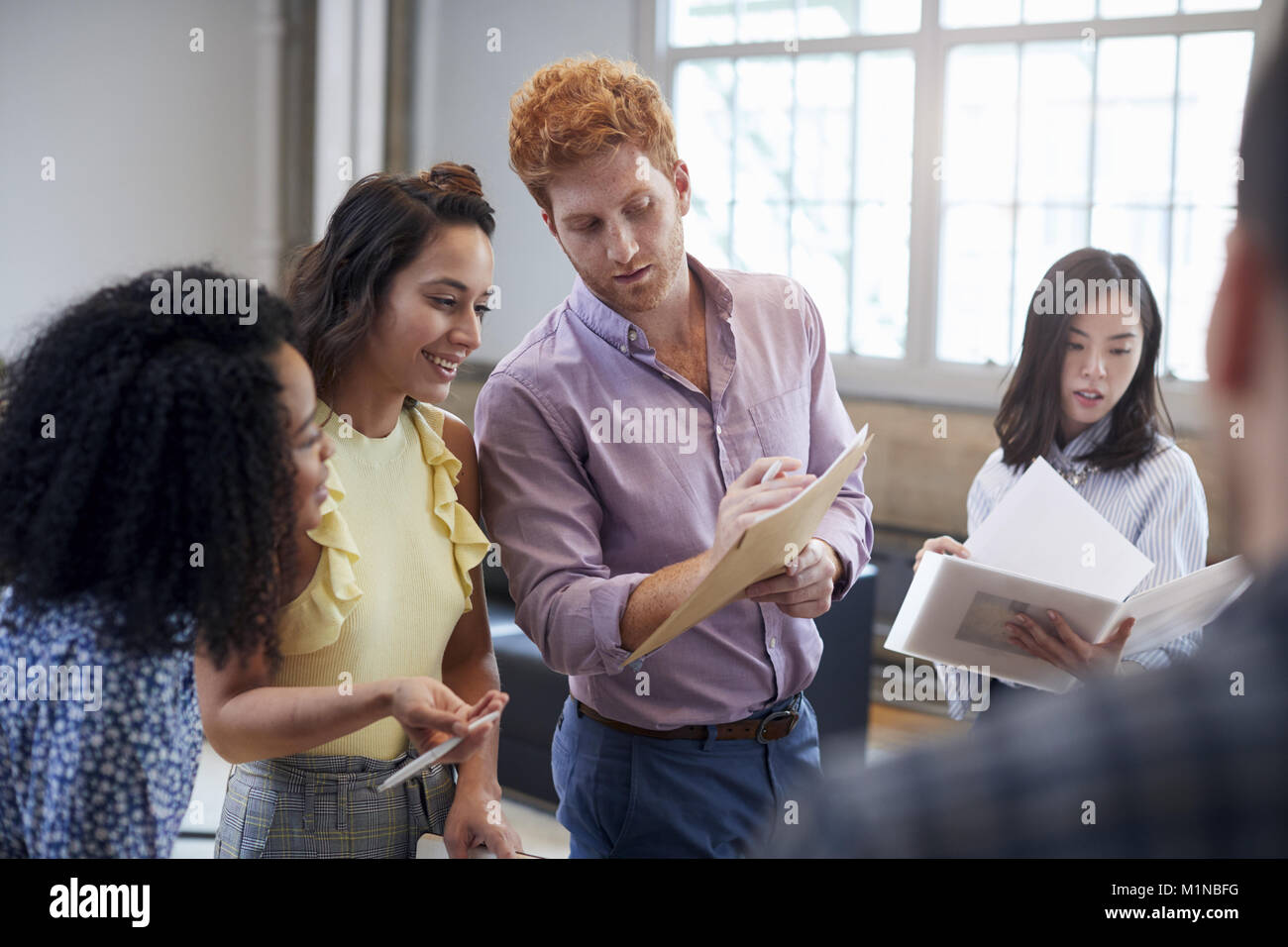 Young creatives discussing brainstorm ideas, close up Stock Photo - Alamy Young creatives discussing brainstorm ideas, close up Stock Photo - Alamy