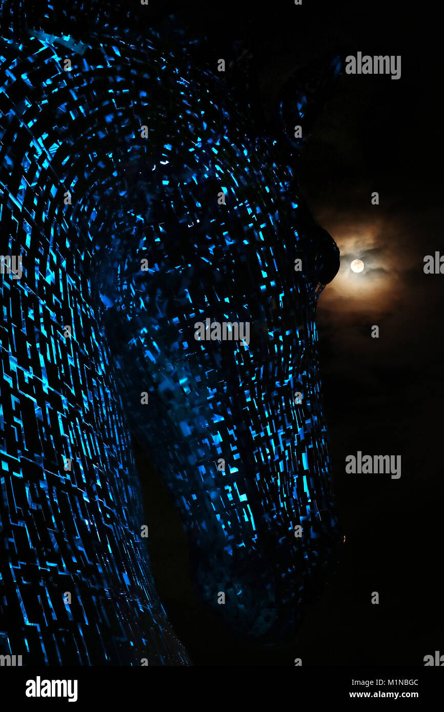 A blue moon rises over the Kelpies in Central Scotland Stock Photo - Alamy