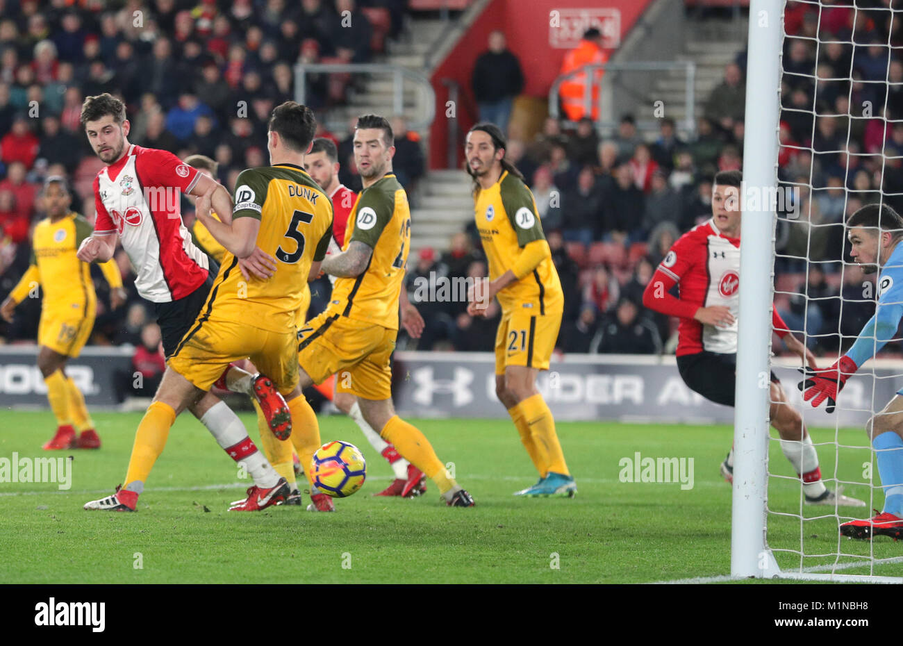 Southampton's Jack Stephens (left) scores his side's first goal of the ...