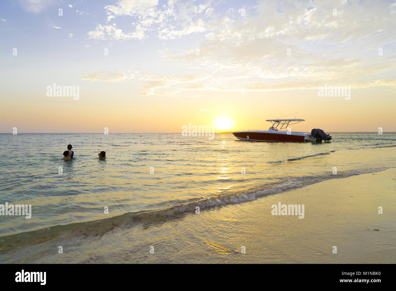 Sailboat at beautiful Island and sunset Stock Photo - Alamy