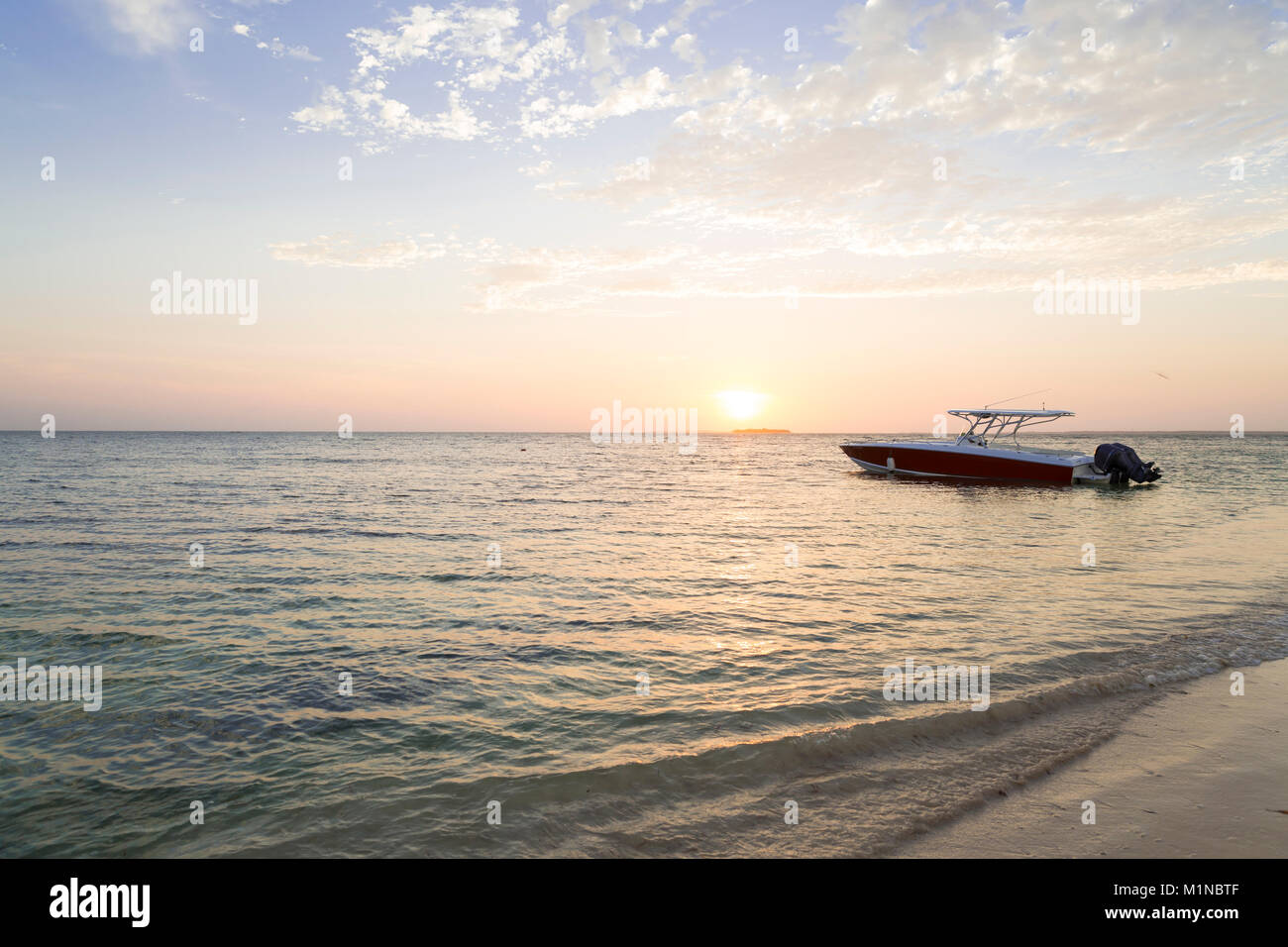 Sailboat at beautiful Island and sunset Stock Photo - Alamy