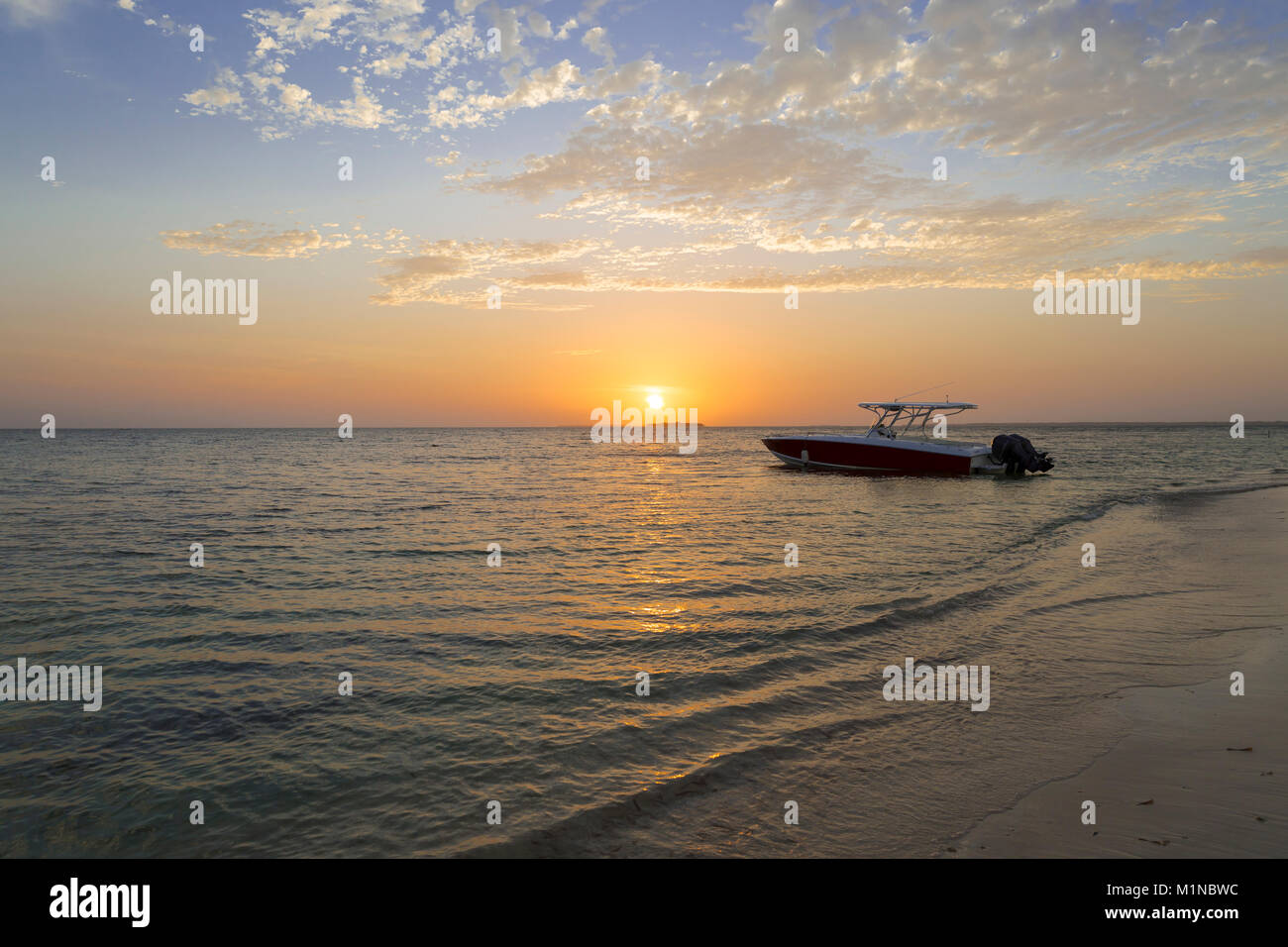 Sailboat at beautiful Island and sunset Stock Photo - Alamy
