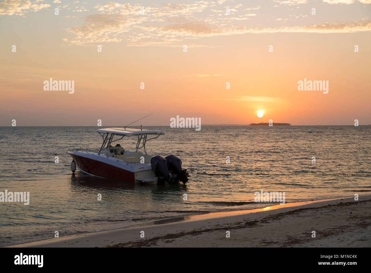 Sailboat at beautiful Island and sunset Stock Photo - Alamy