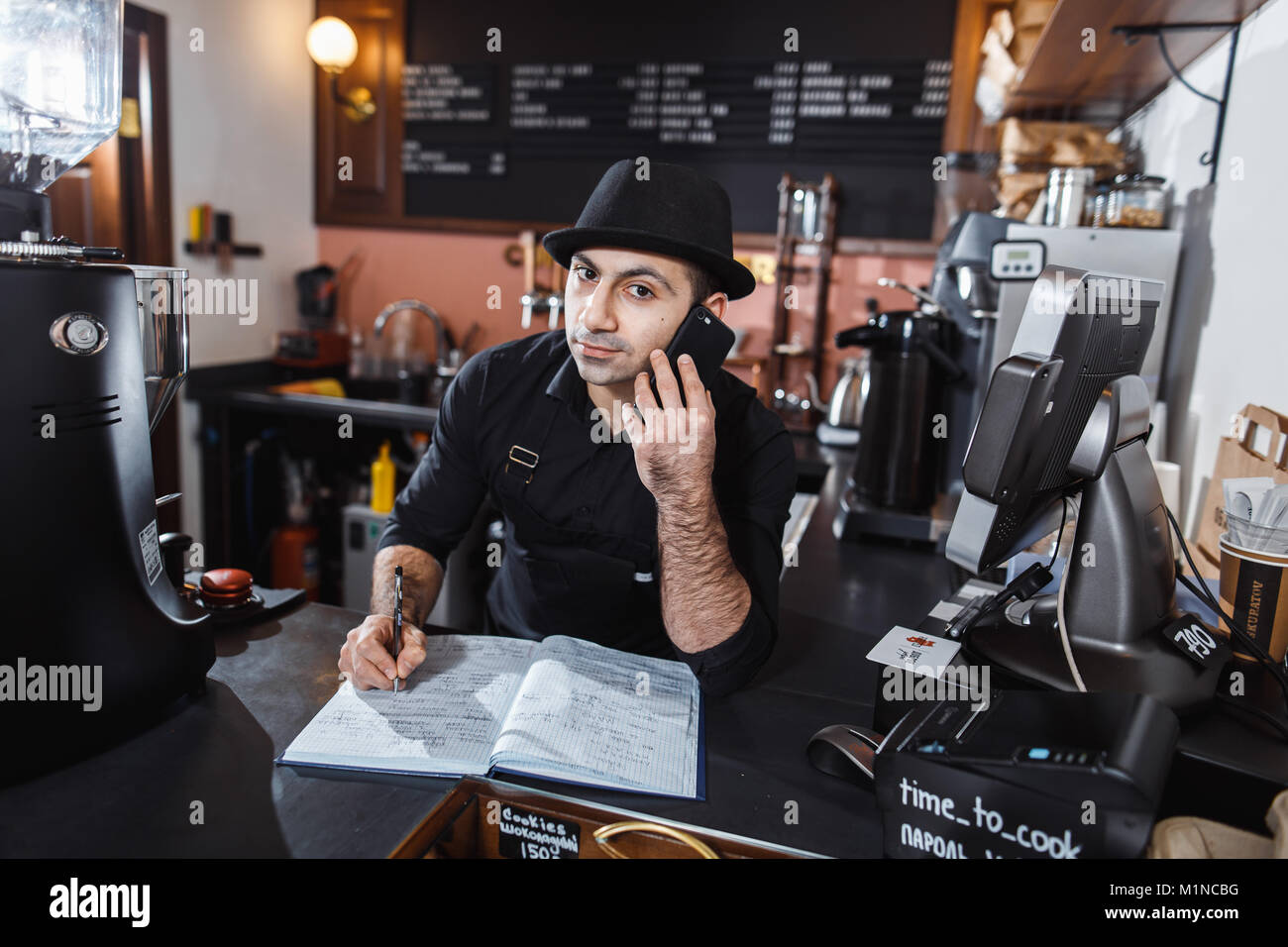 Barista make order Stock Photo - Alamy