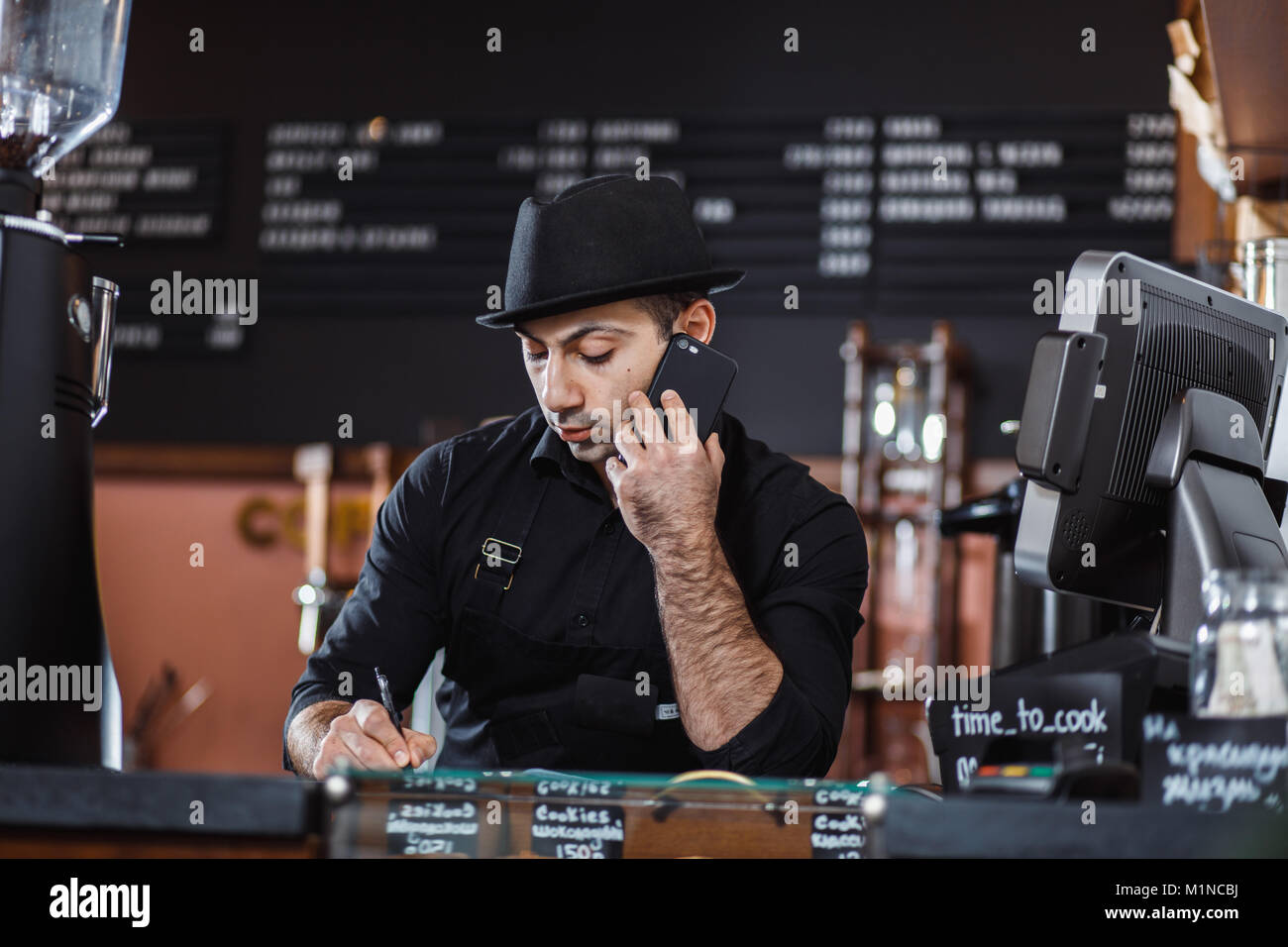 Barista make order Stock Photo - Alamy
