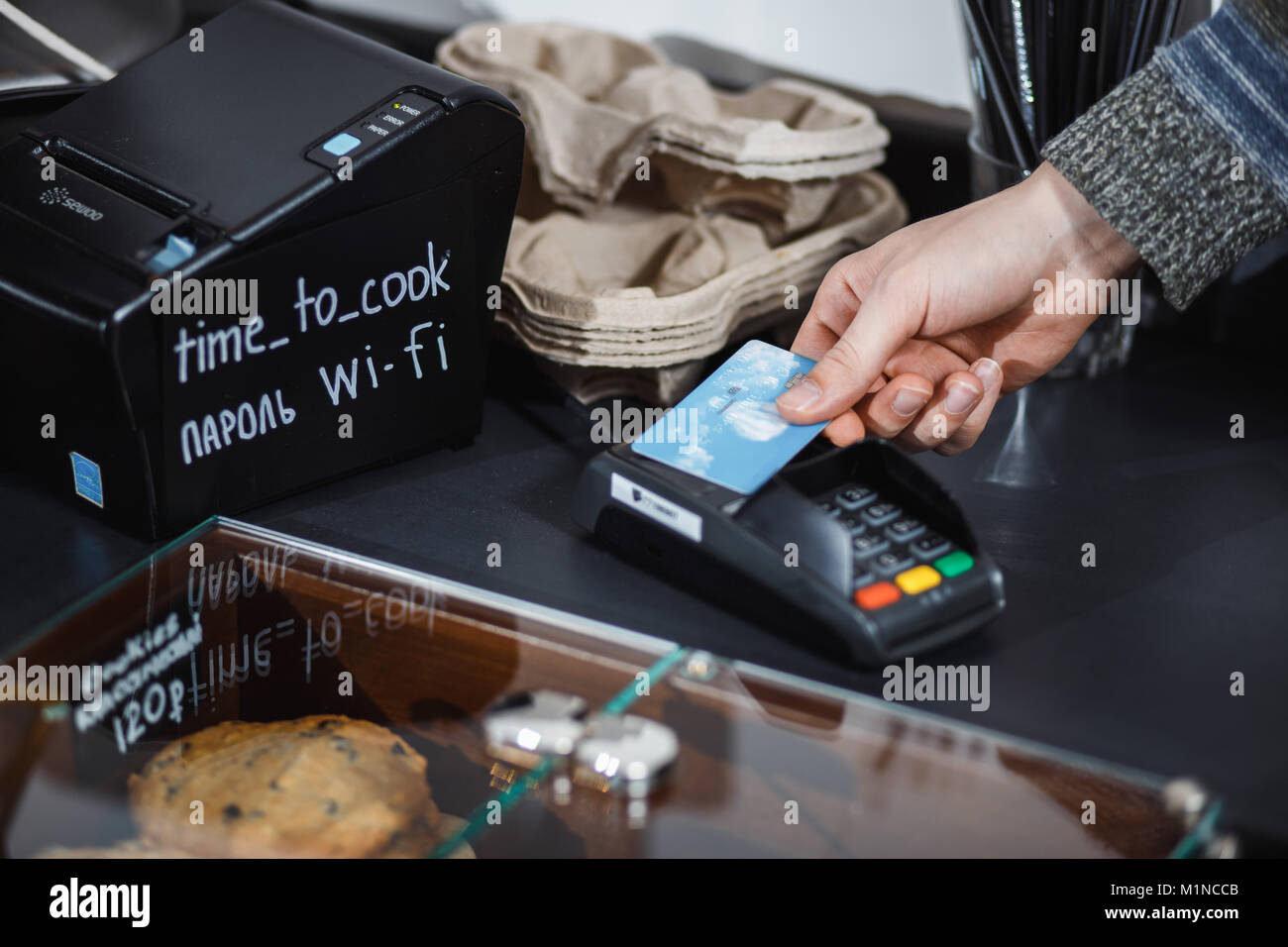 Contactless payment card machine hi-res stock photography and images ...