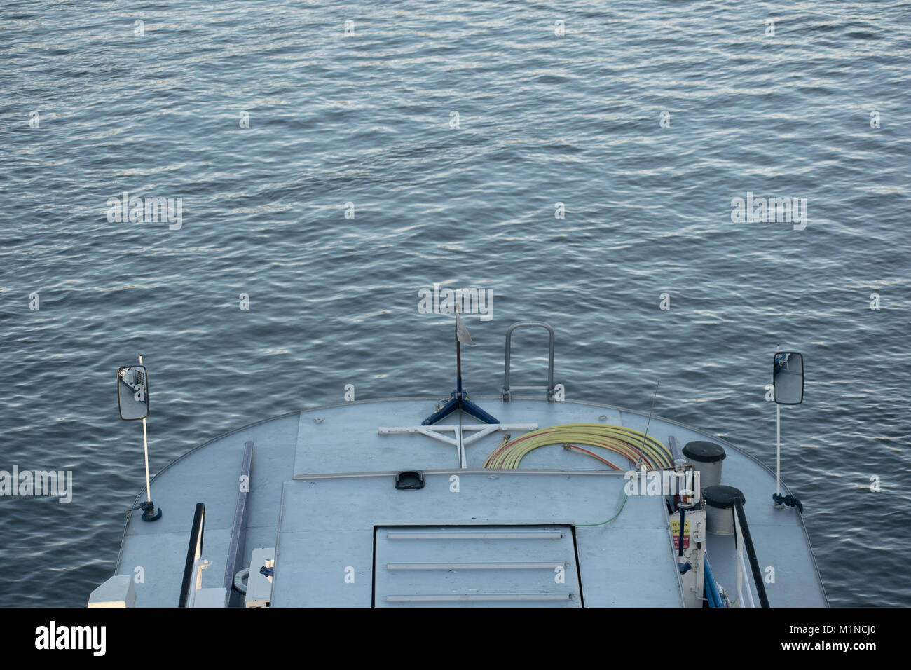Wide boat on river Stock Photo - Alamy