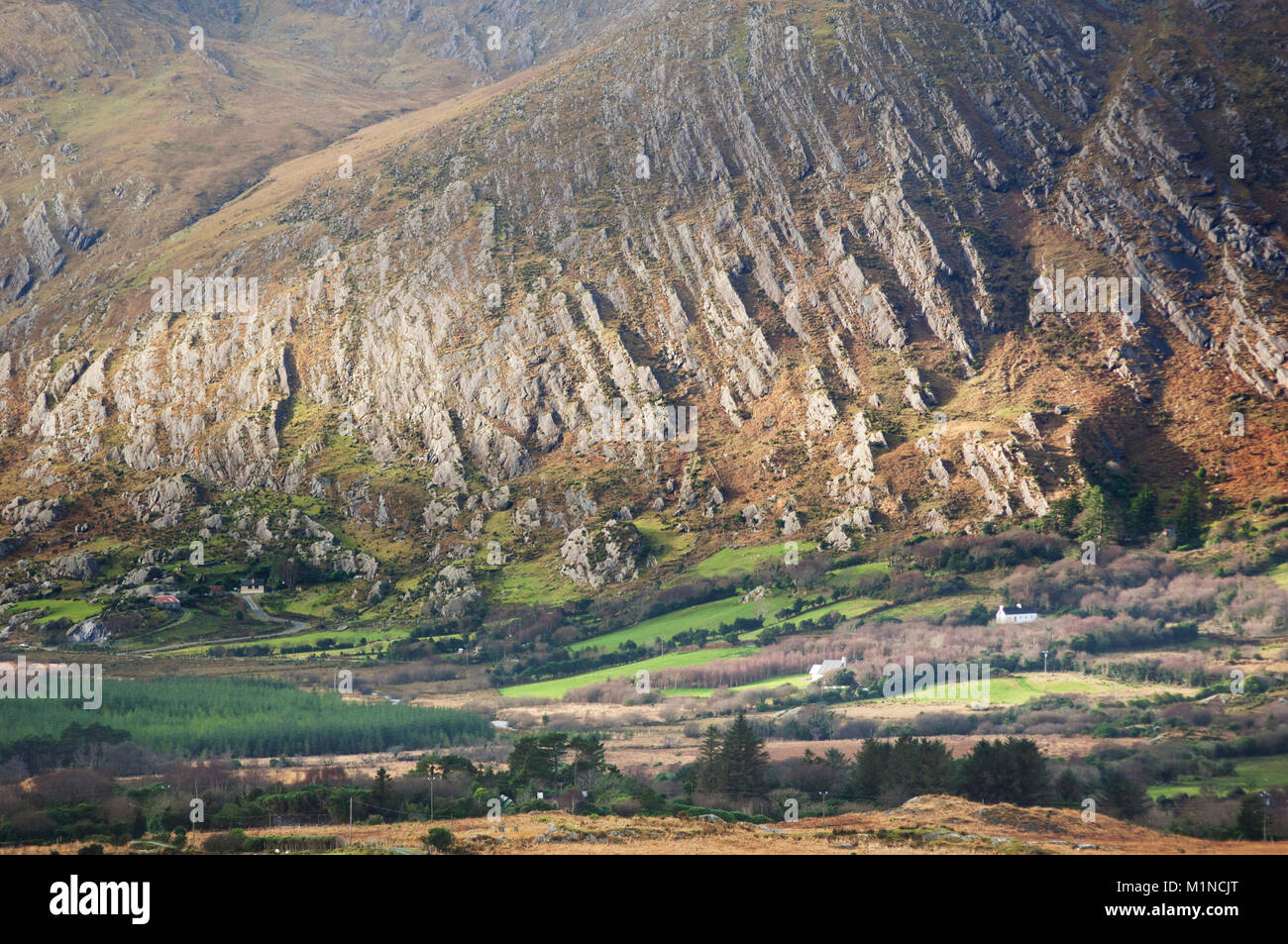 The sandstone cliffs of the Caha Mountains viewed from the Healy Pass ...