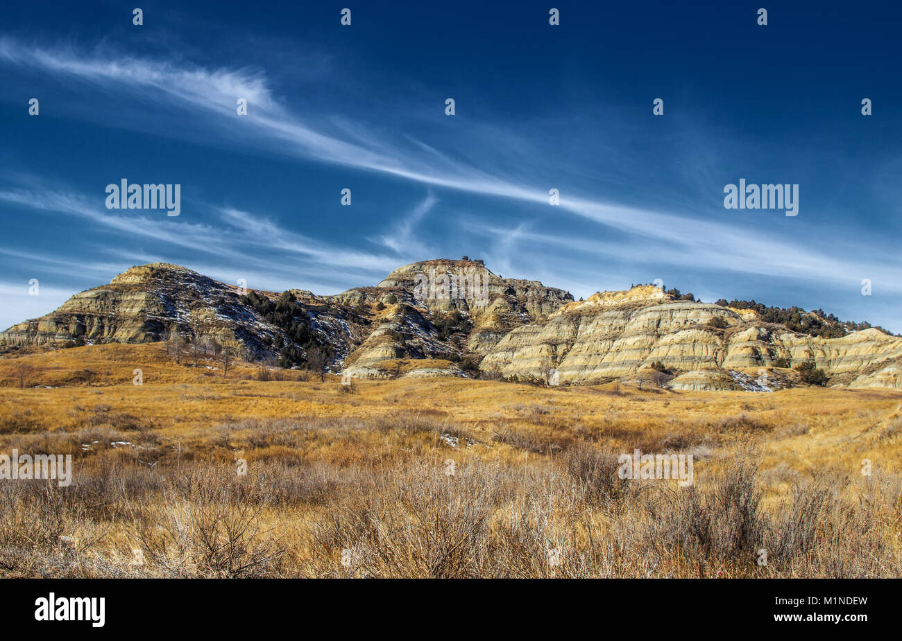 Rocky formations of the badlands in South Dakota in a brown spring time ...