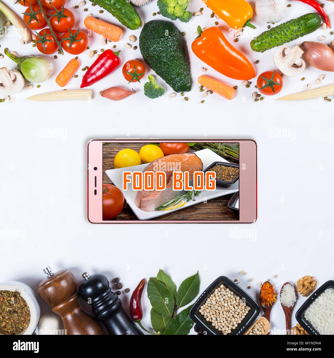Food blog concept. Big set of vegetables, spices and smartphone on a ...