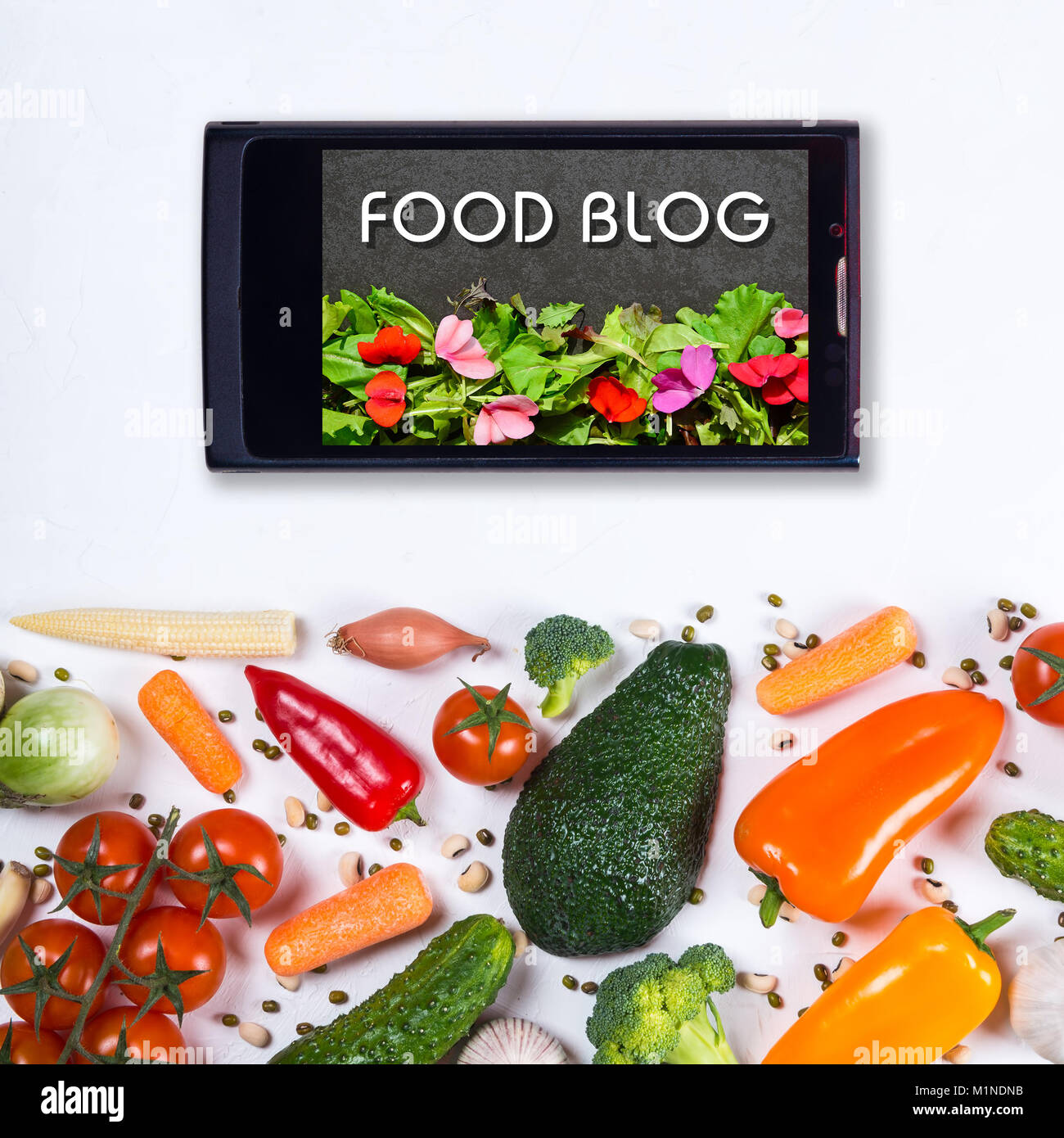 Food blog concept. Big set of vegetables, spices and smartphone on a ...