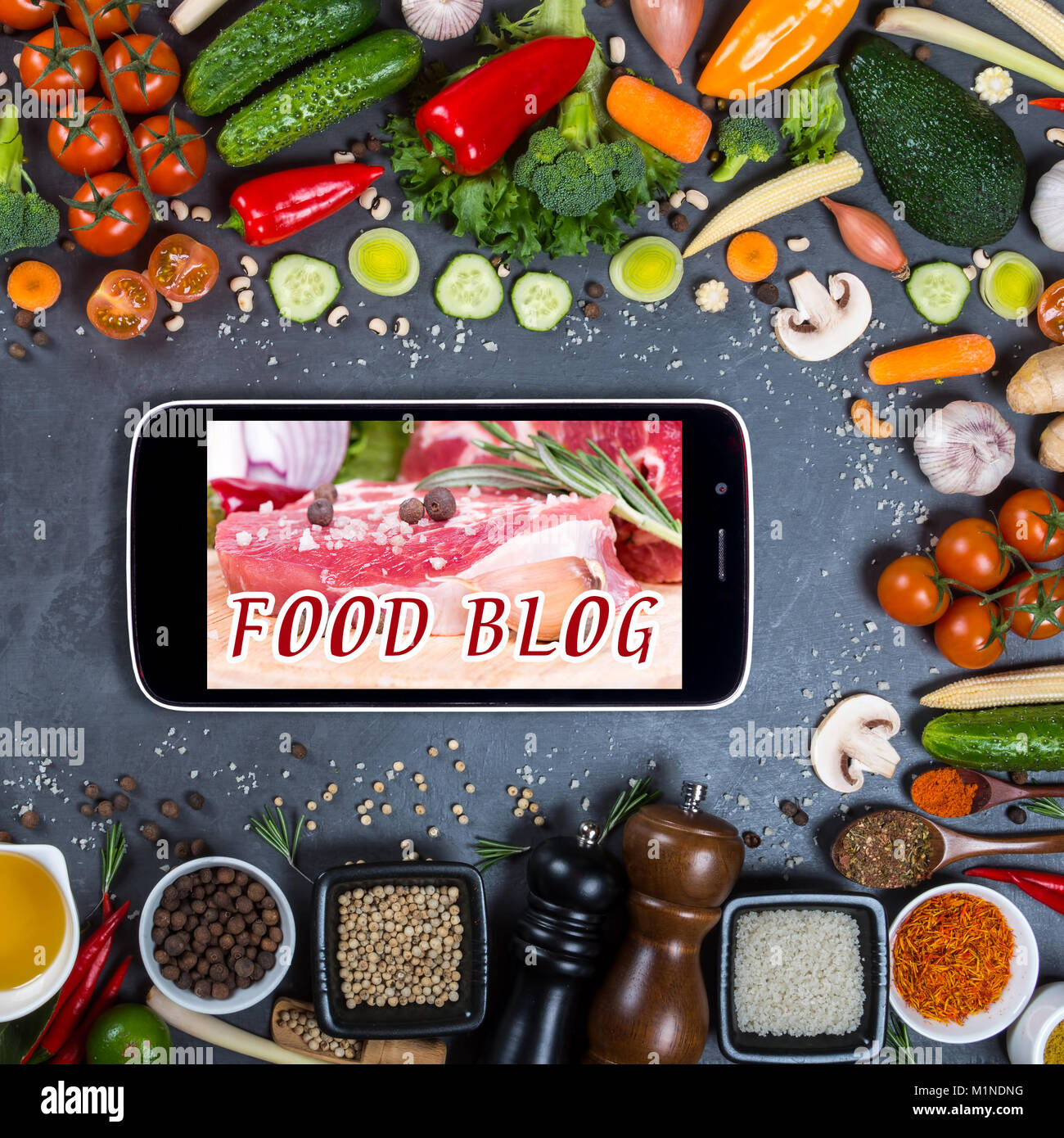 Food blog concept. Big set of vegetables, spices and smartphone on a ...
