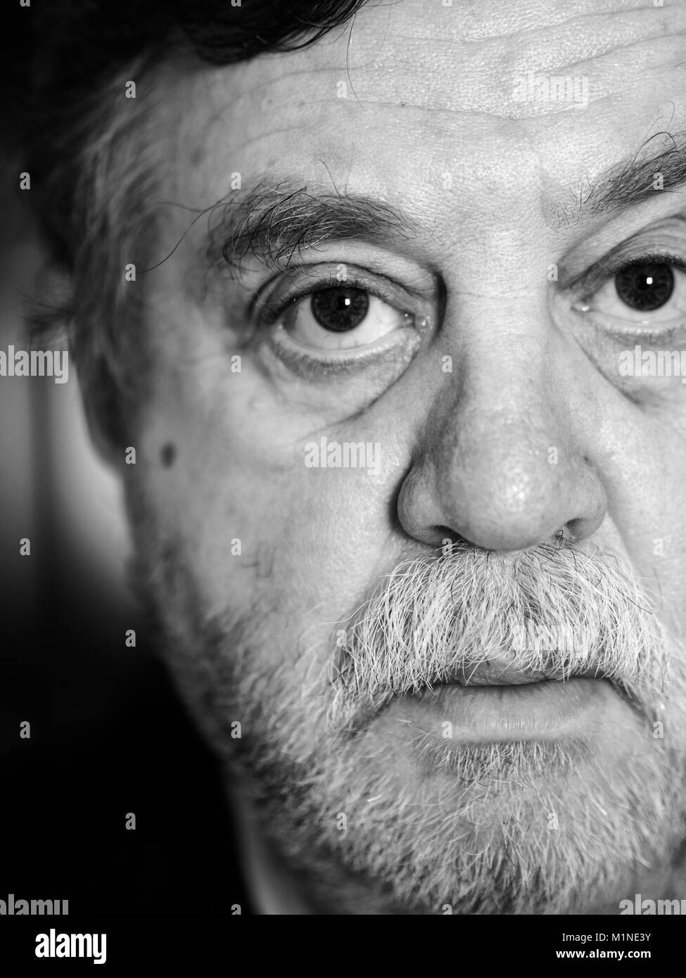 Closeup serious portrait old senior Black and White Stock Photos ...