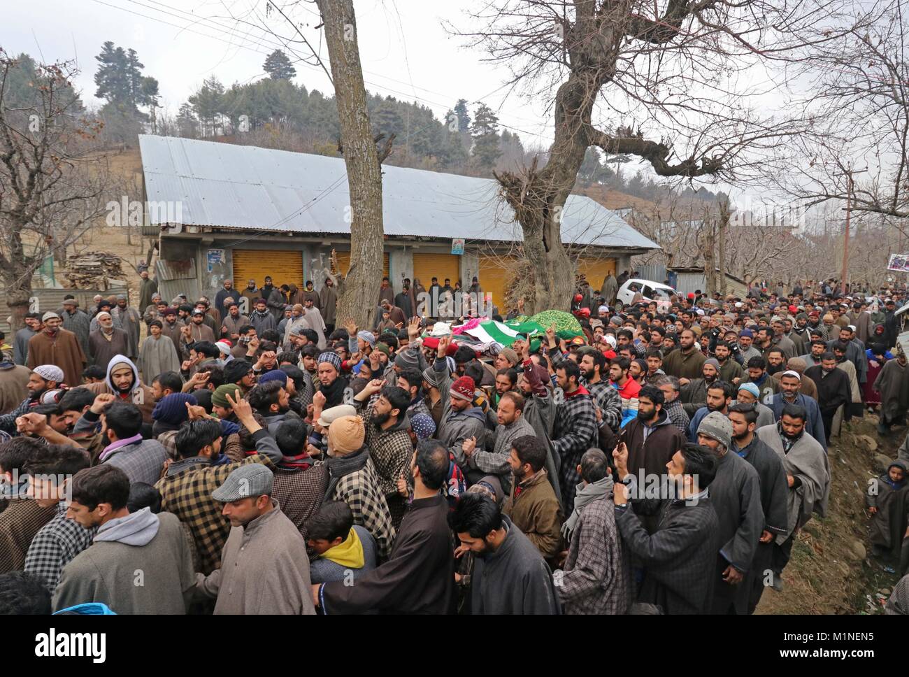 India. 31st Jan, 2018. Villagers carrying the body of a slain youth ...