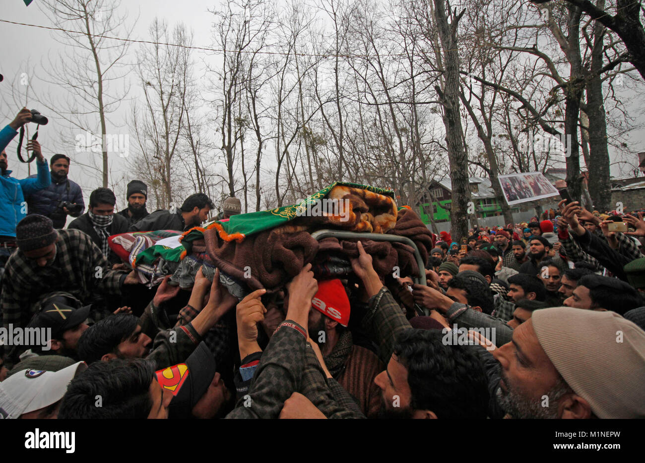 India. 30th Jan, 2018. Villagers carrying the body of a slain youth ...