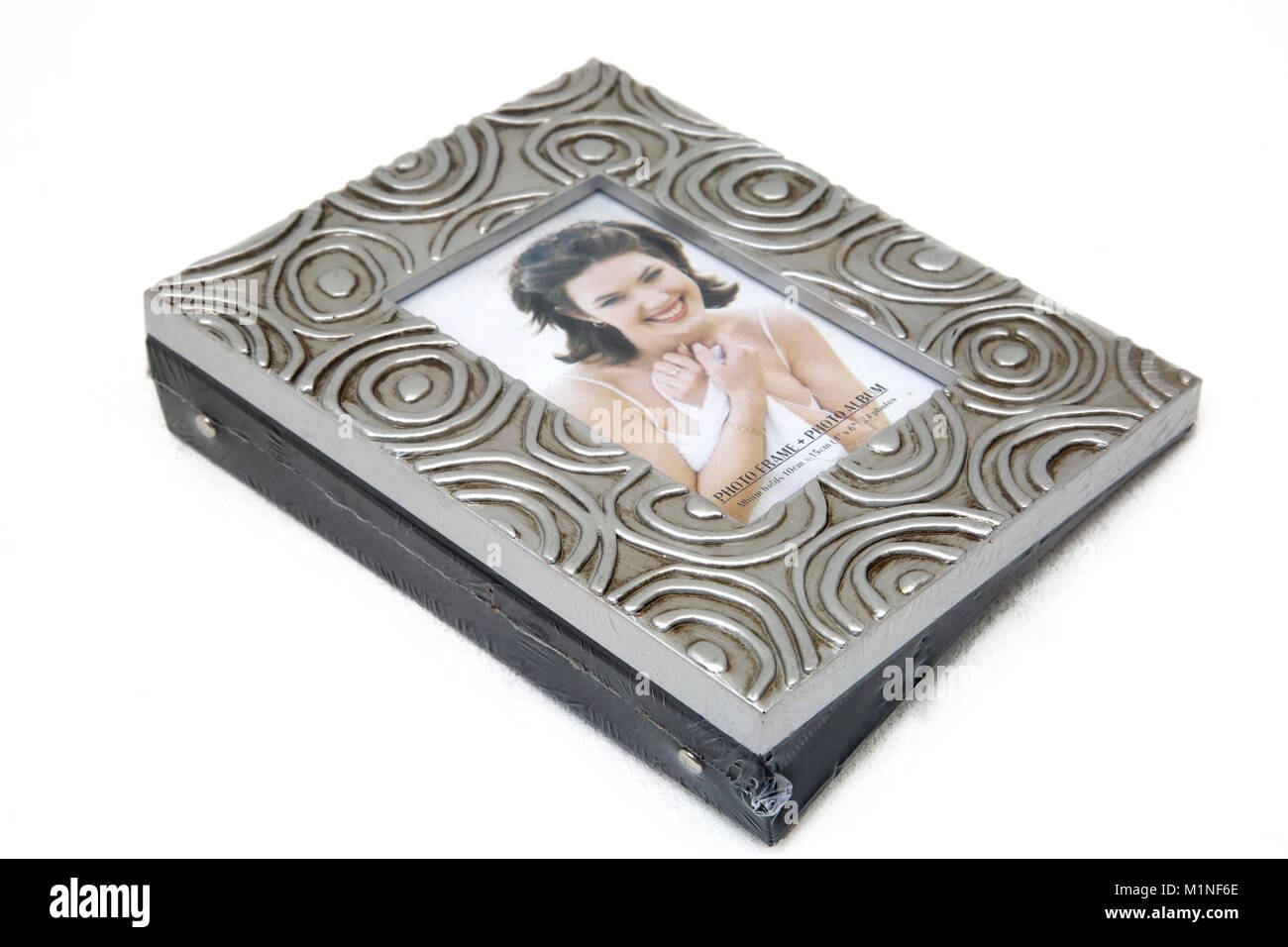 Silver Photo Frame And Photo Album Stock Photo - Alamy