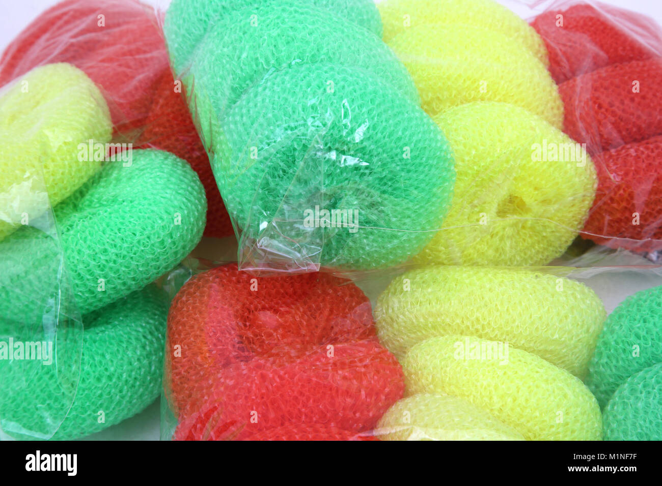 Packs of Colourful Plastic Scourers Stock Photo - Alamy