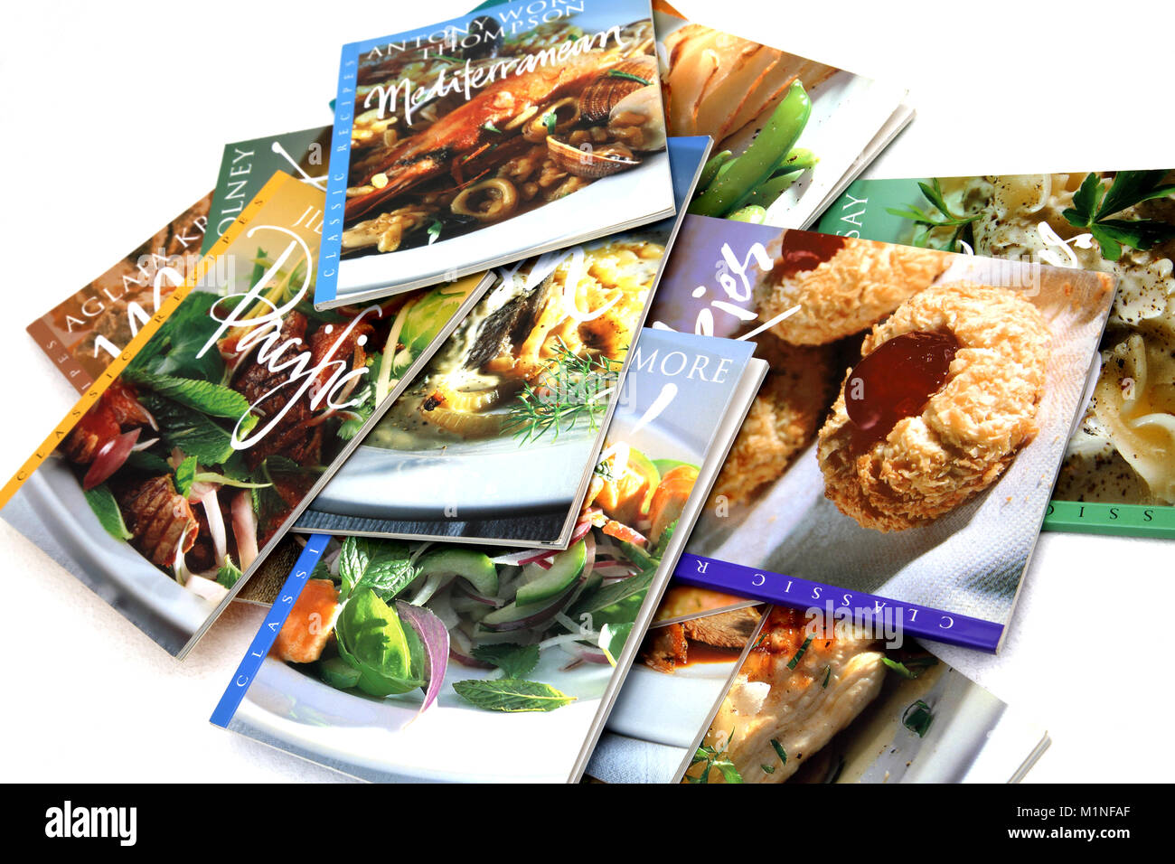 Pile of cookery books hi-res stock photography and images - Alamy